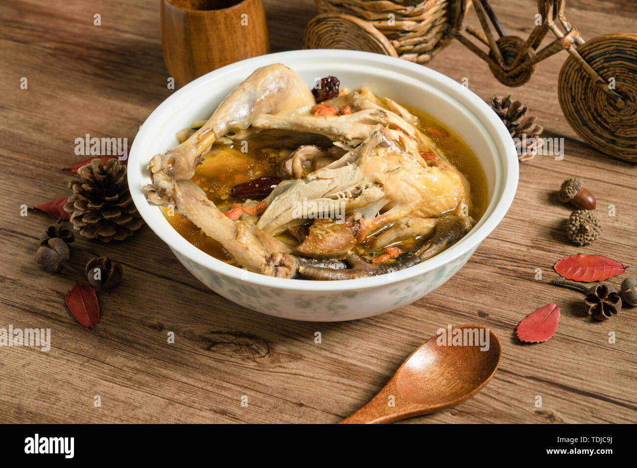 Chicken soup with wood pattern background Stock Photo - Alamy