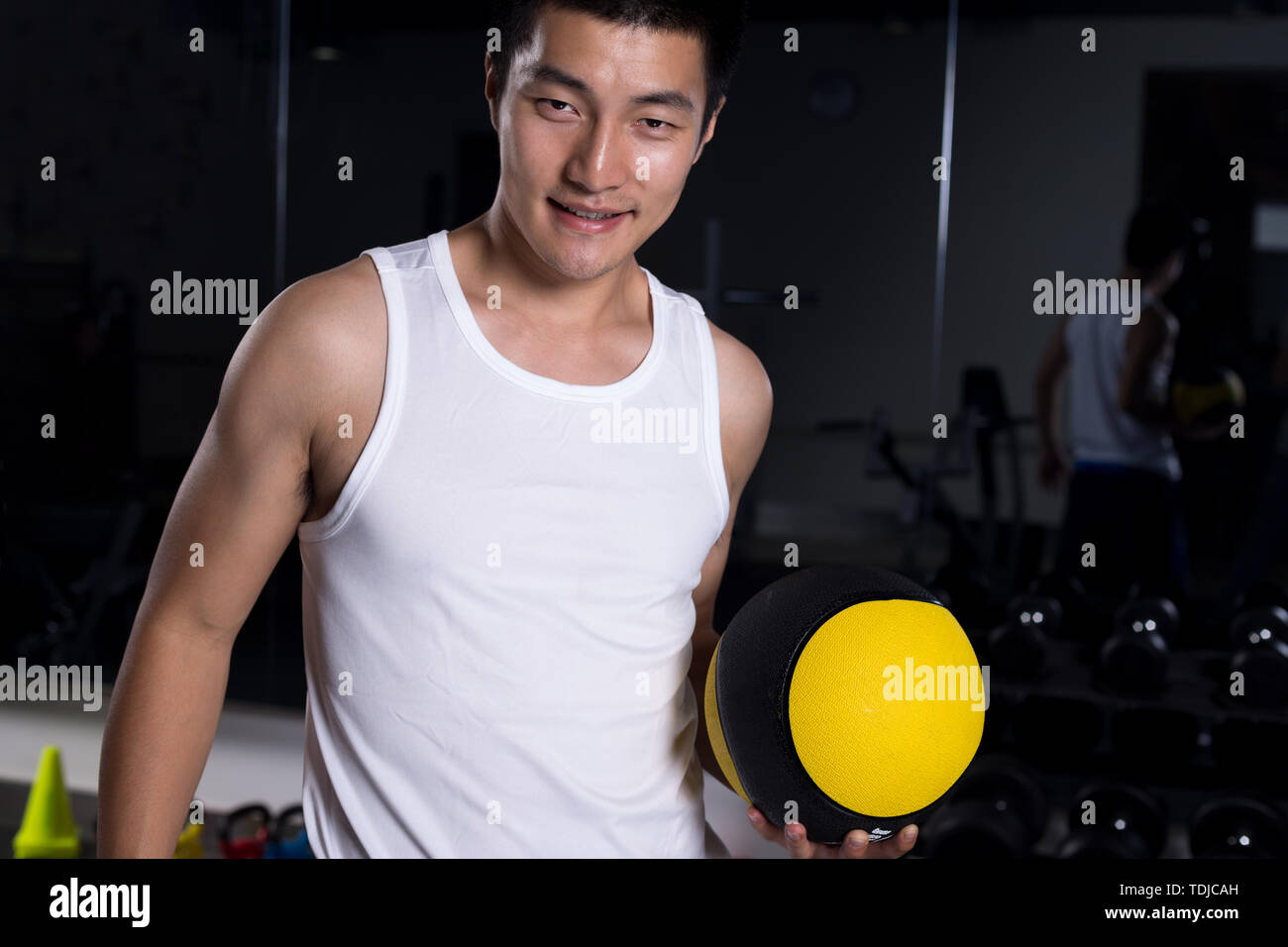 handsome young man working out in modern gym Stock Photo - Alamy