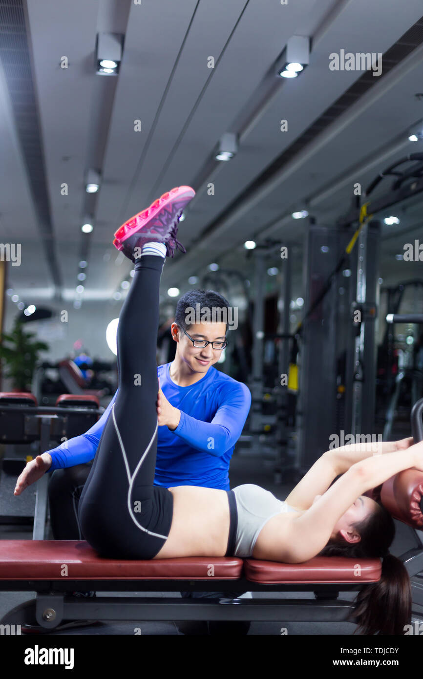 young asian people working out in modern gym Stock Photo - Alamy