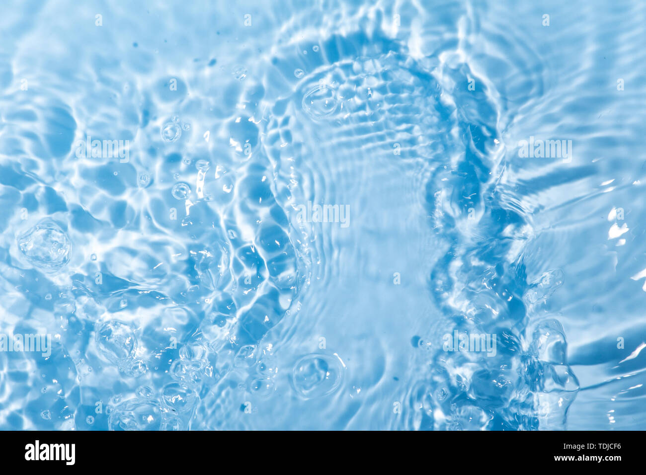 Crystal clear water ripples Stock Photo - Alamy