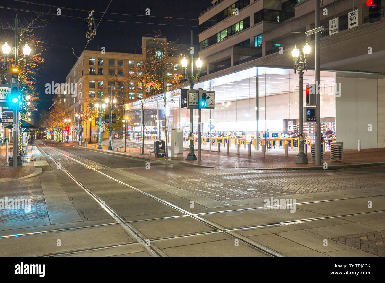 intersection of brick road and modern building Stock Photo - Alamy