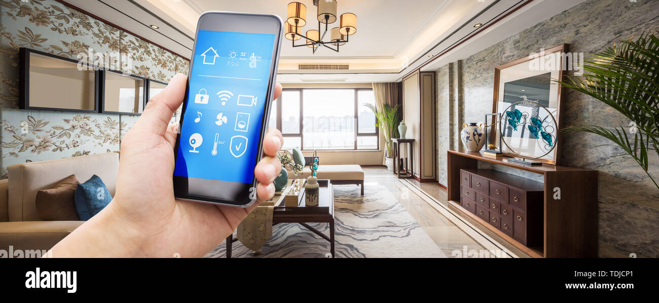 smart phone with smart home with modern living room Stock Photo - Alamy