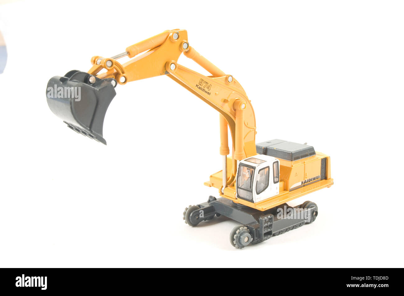 Yellow excavators Cut Out Stock Images & Pictures - Alamy