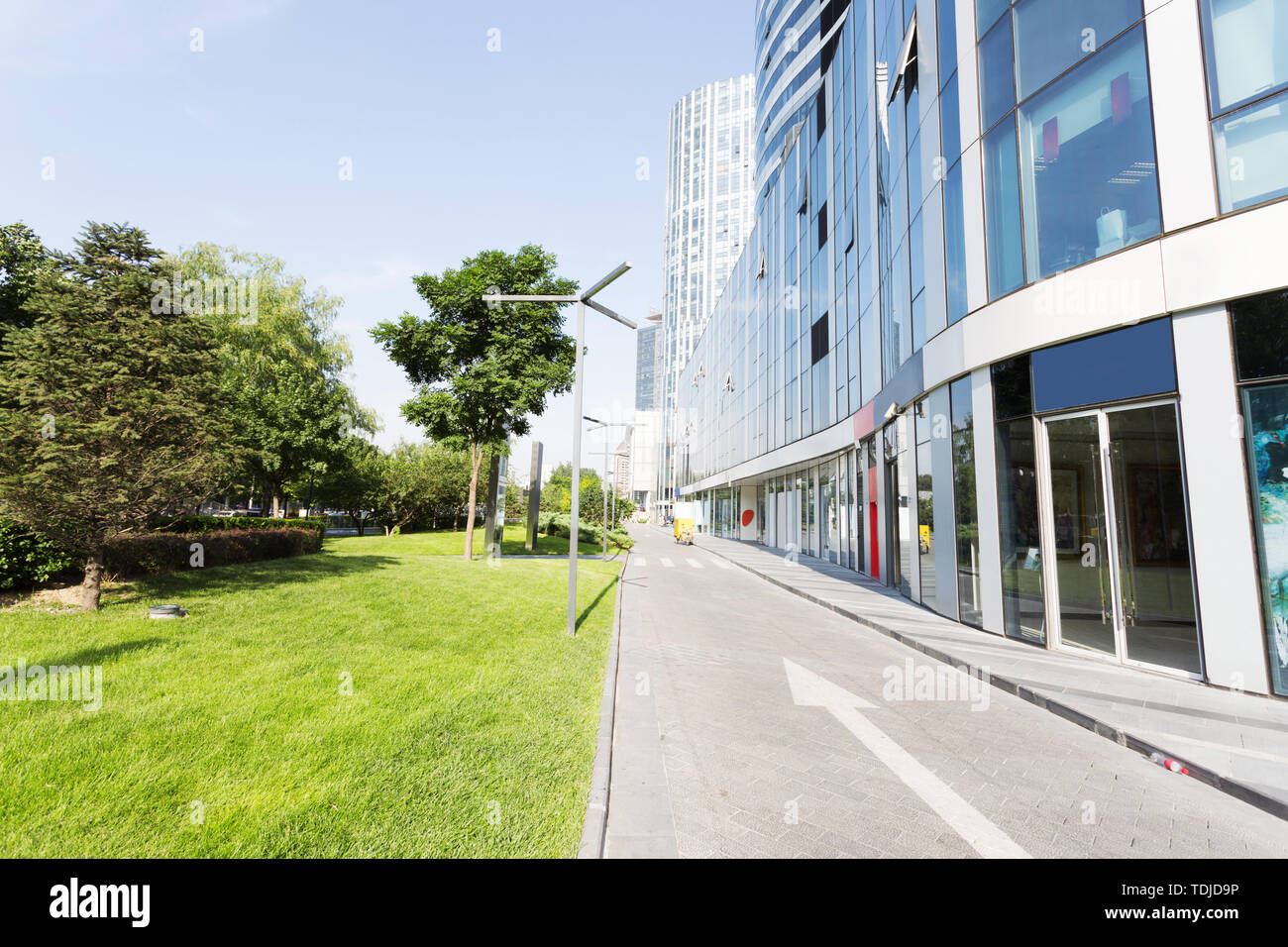 footpath around modern office building Stock Photo - Alamy