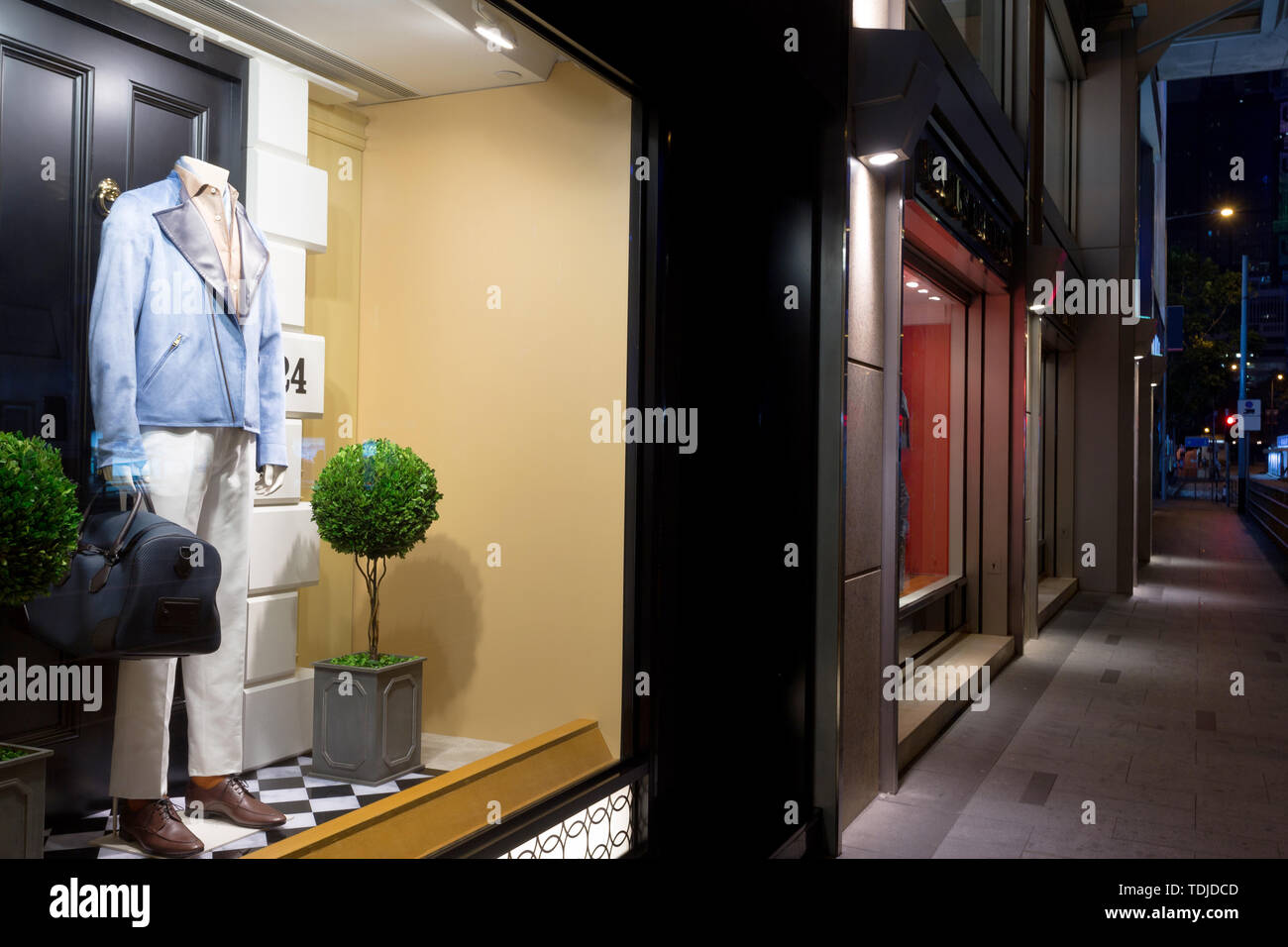 mannequin in fashion shop display window Stock Photo - Alamy