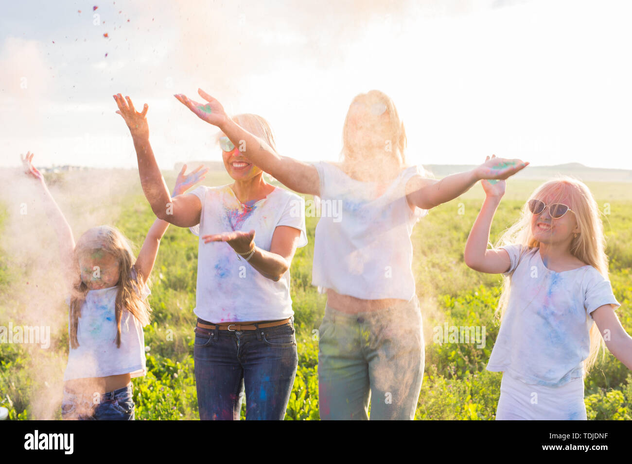 Fun, colors, Indian holidays and people concept - young female people ...