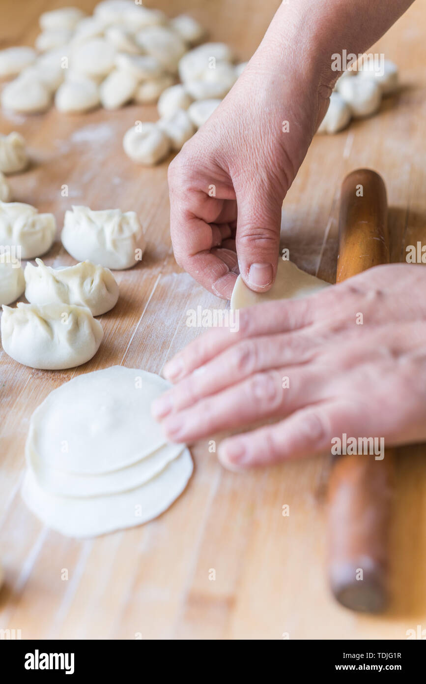 The making process of making dumplings and rolling dumplings Stock ...