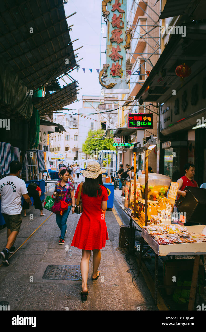 Red dress tour the big three buses Stock Photo - Alamy