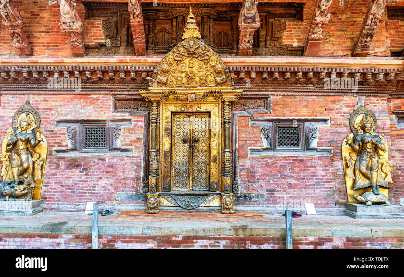 Decorative golden doors at Royal Palace in Patan Durbar Square. Mul ...