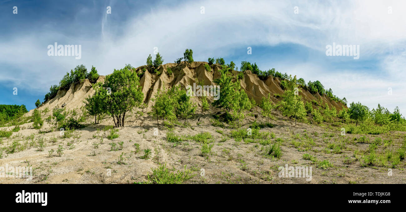 Quarries for the extraction of limestone. A mound formed by small piles ...
