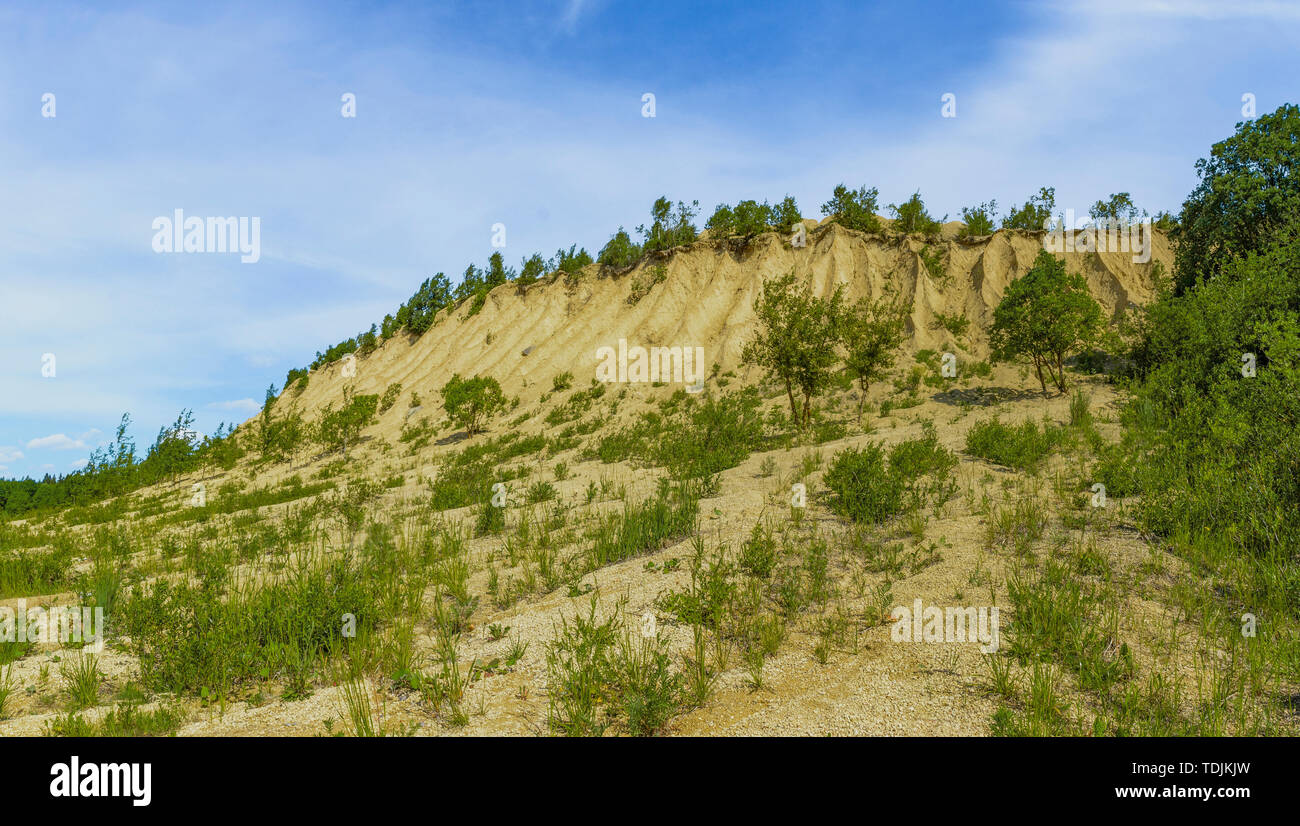Quarries for the extraction of limestone. A mound formed by small piles ...