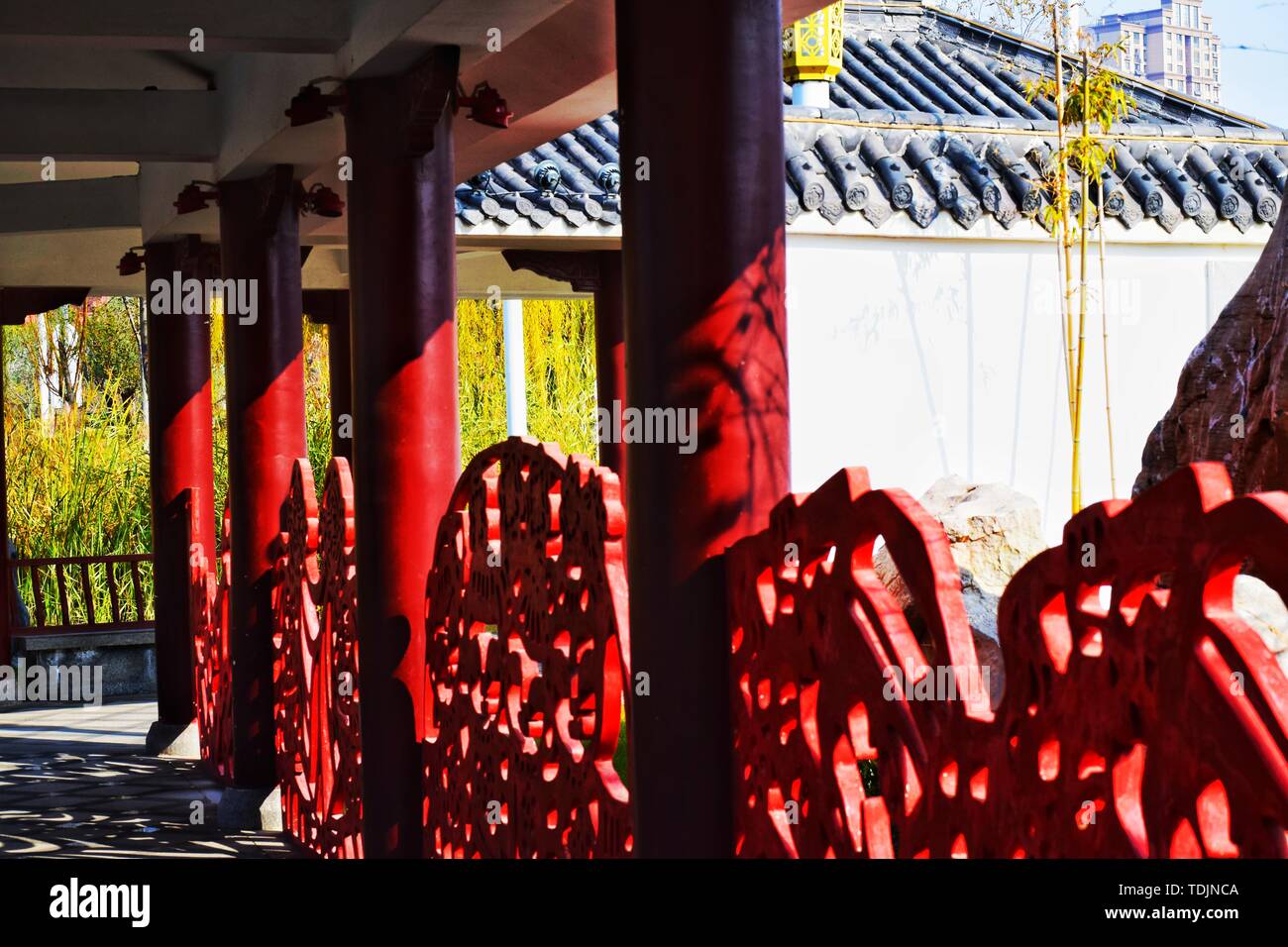 Bamboo shadow snuggle red bar Stock Photo - Alamy