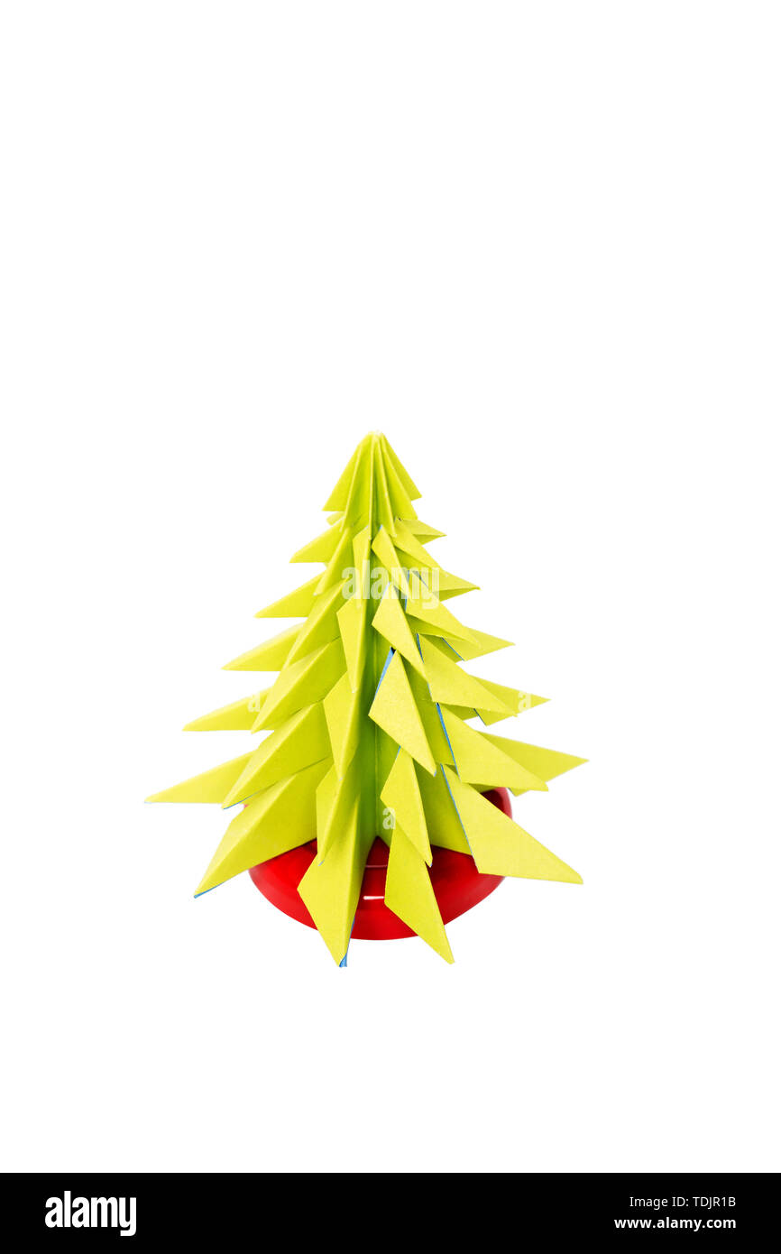 Green paper tree on a white background Stock Photo - Alamy