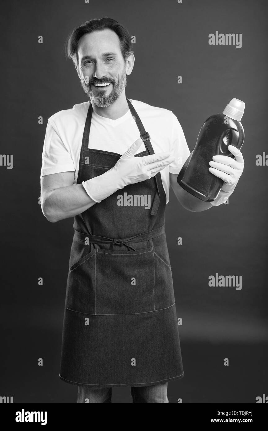 Cleaning day today. Bearded guy cleaning home. Cleanliness and order ...