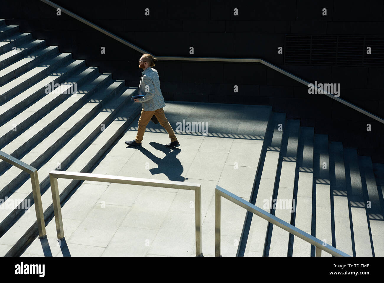 Moving up stairs hi-res stock photography and images - Alamy