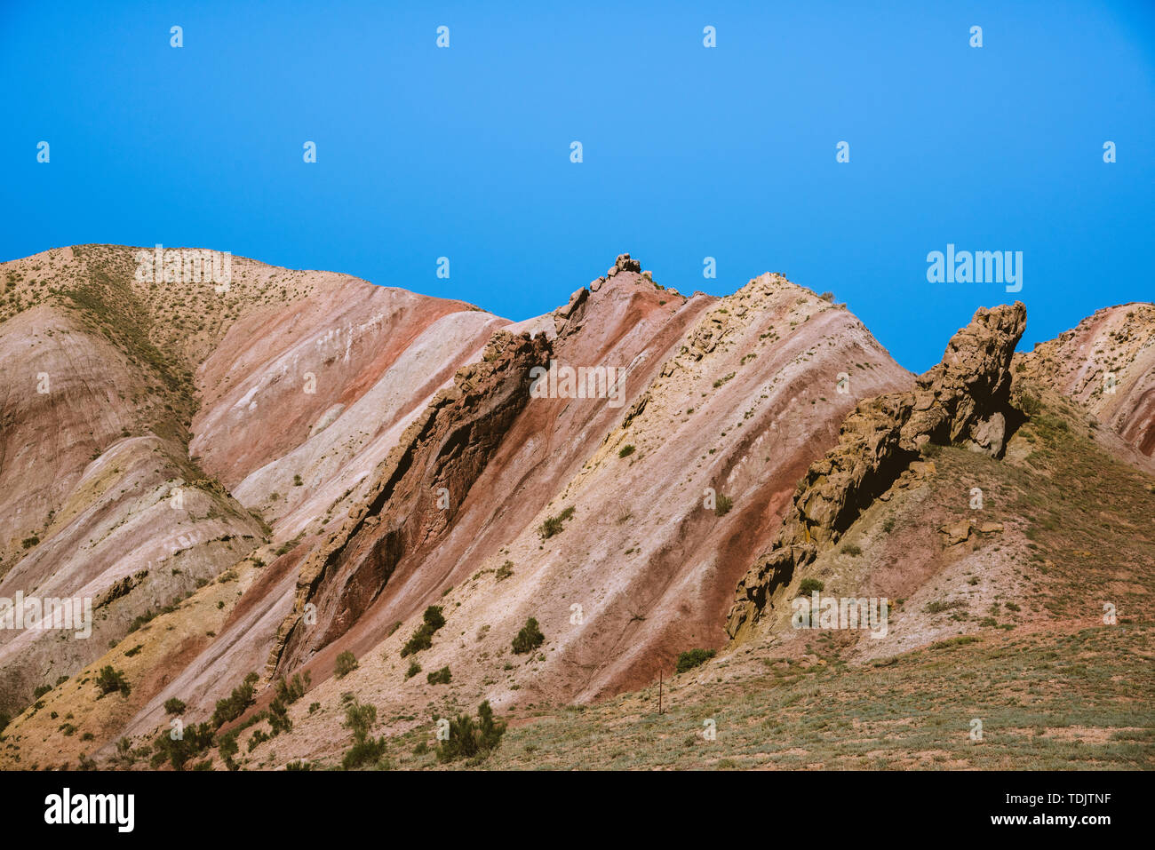 Colorful Jurassic rocky hillside slope slope Stock Photo - Alamy