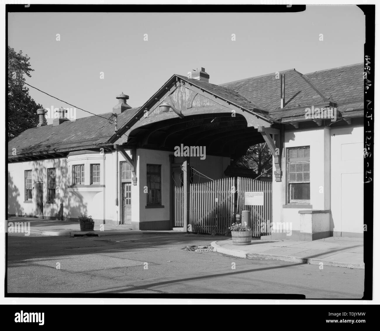 OBLIQUE EXTERIOR VIEW OF MAIN GATE HOUSE, BUILDING -1, LOOKING NE ...