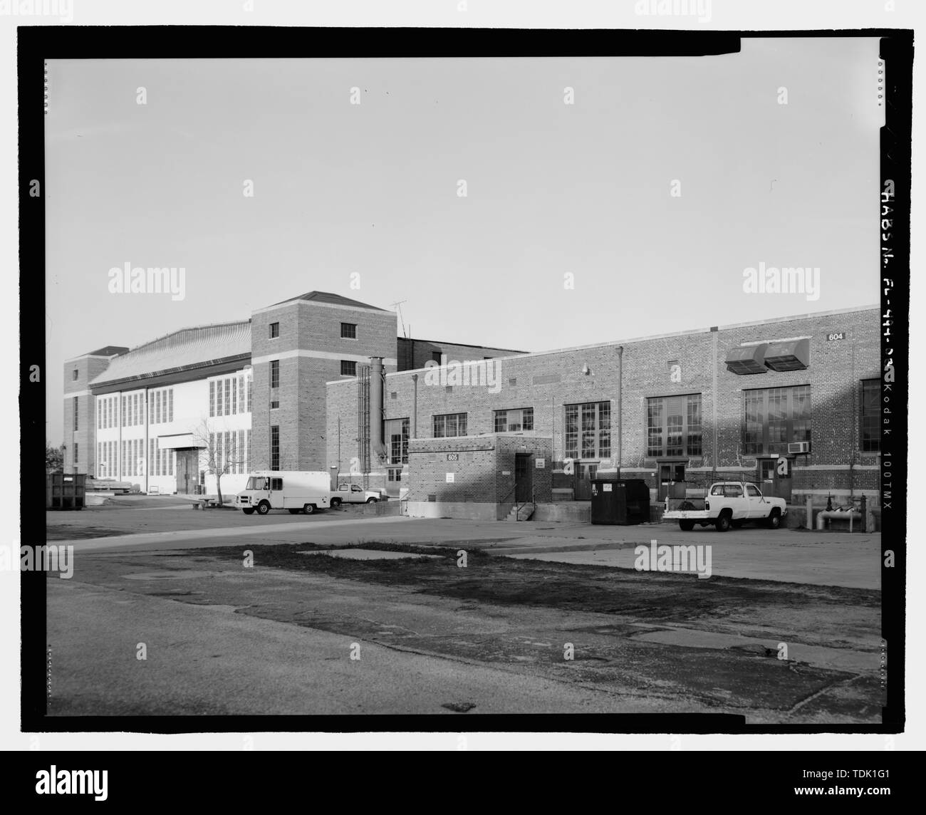 OBLIQUE VIEW OF WEST SIDE, SHOWING ASSEMBLY HANGAR FACING NORTHEAST ...