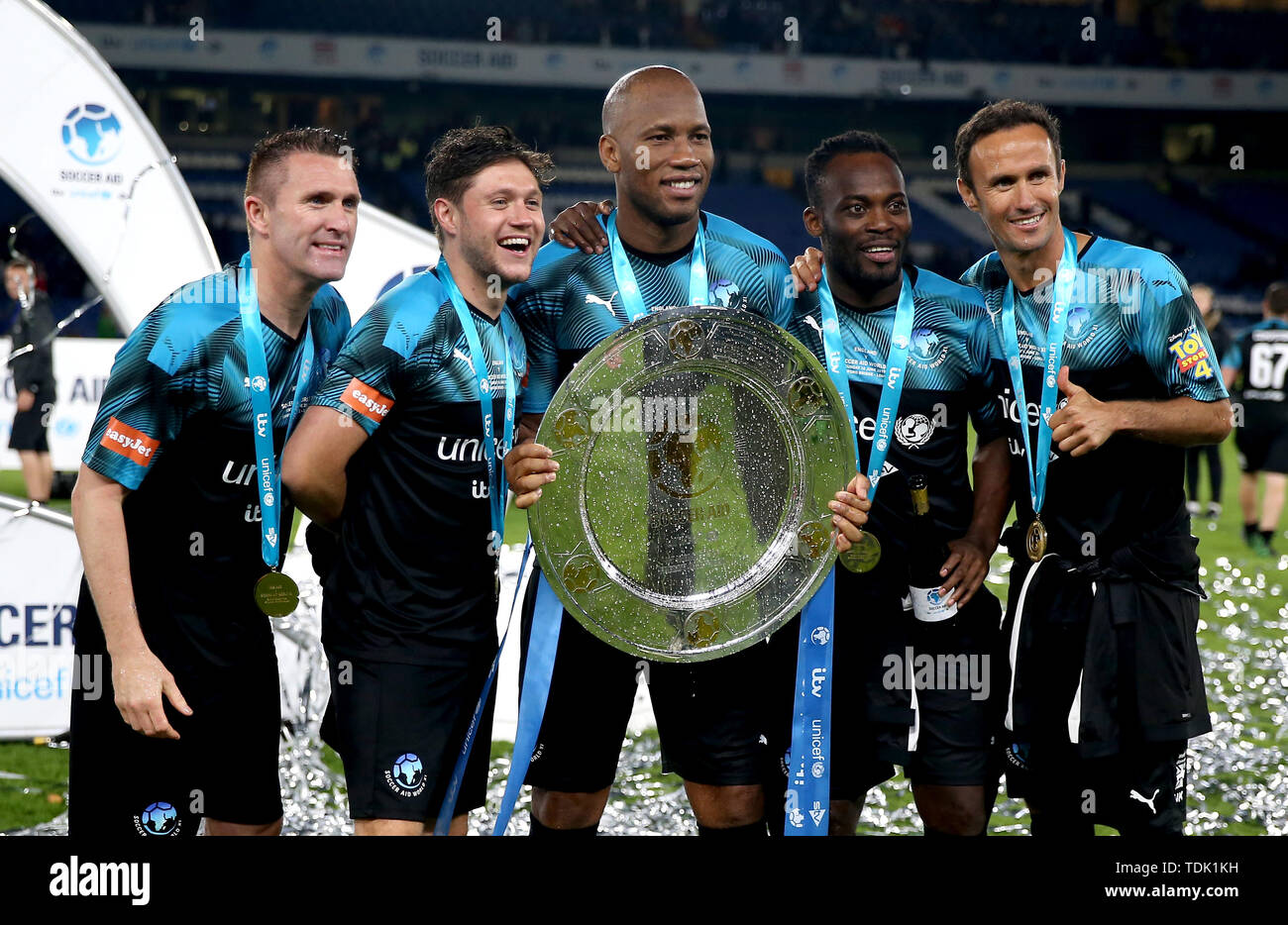 World Eleven team celebrate their victory at the end of the Soccer Aid ...
