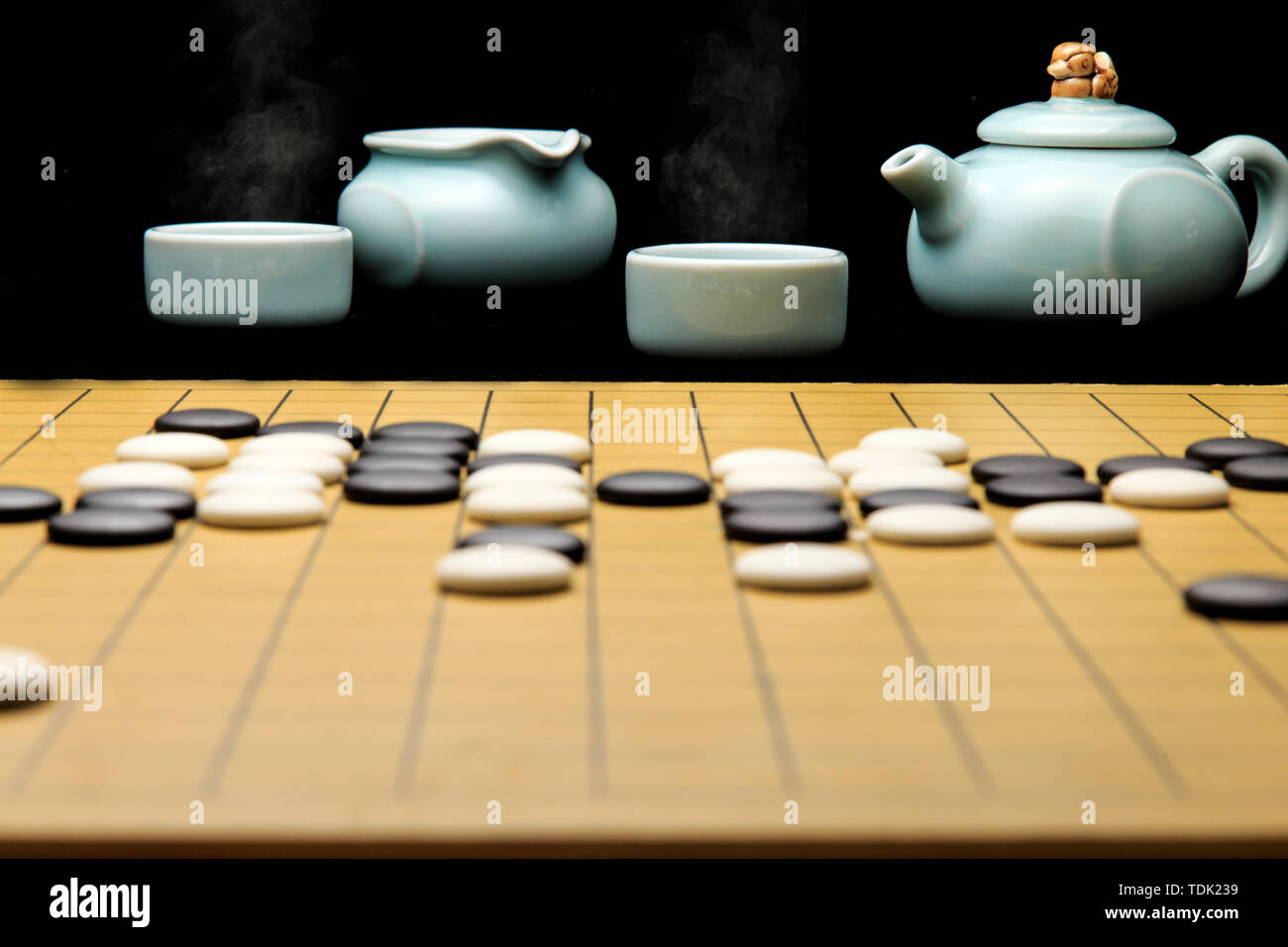 Chessboard and tea set Stock Photo - Alamy