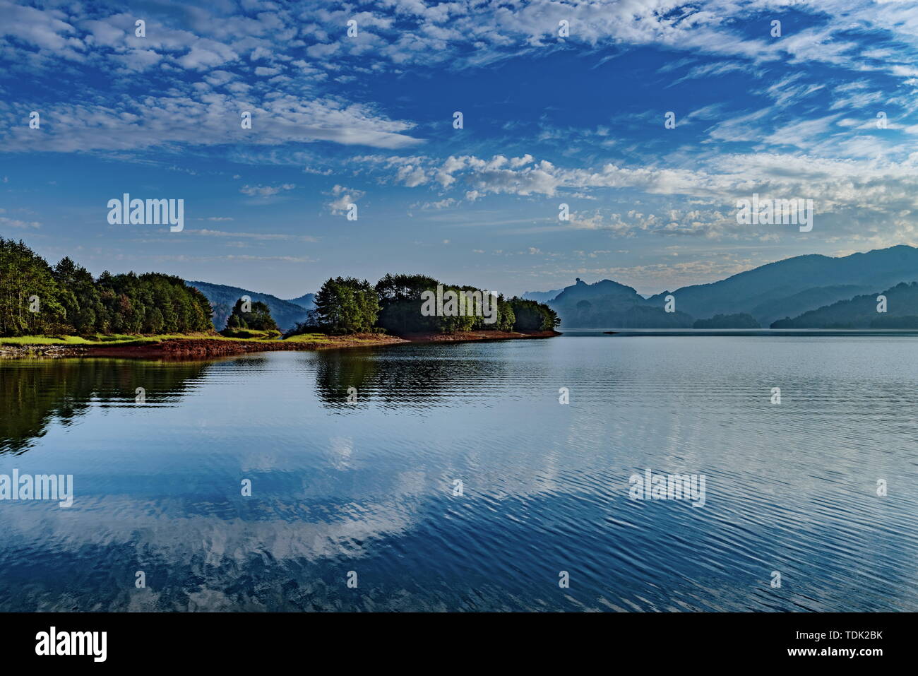 Big Golden Lake skimming Stock Photo - Alamy