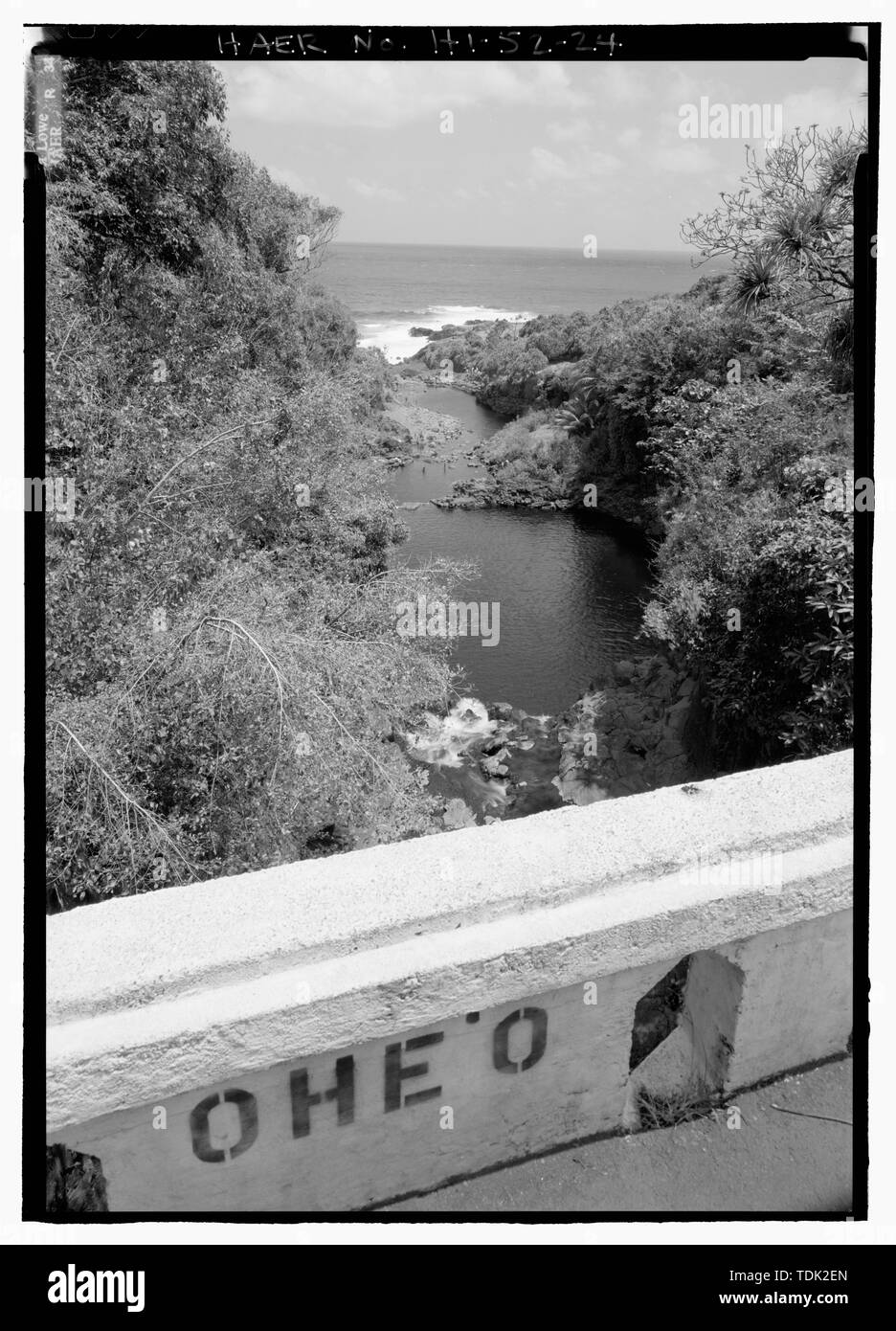 OHE O BRIDGE, POOL AND BEACH FROM ROAD DECK WITH RAIL IN FOREGROUND ...