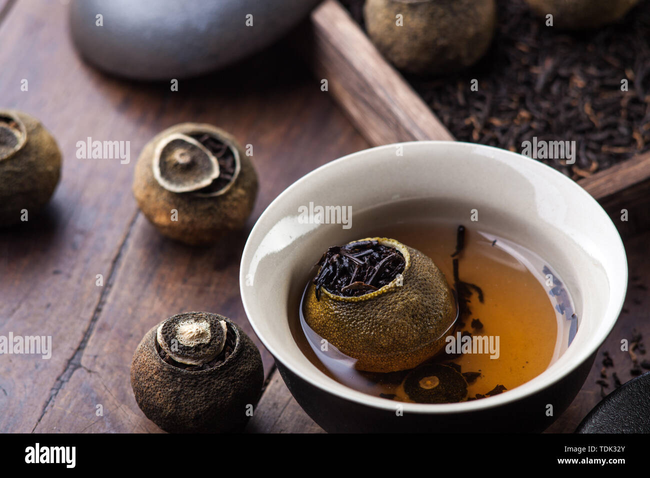 Little green tangerine tea Stock Photo - Alamy