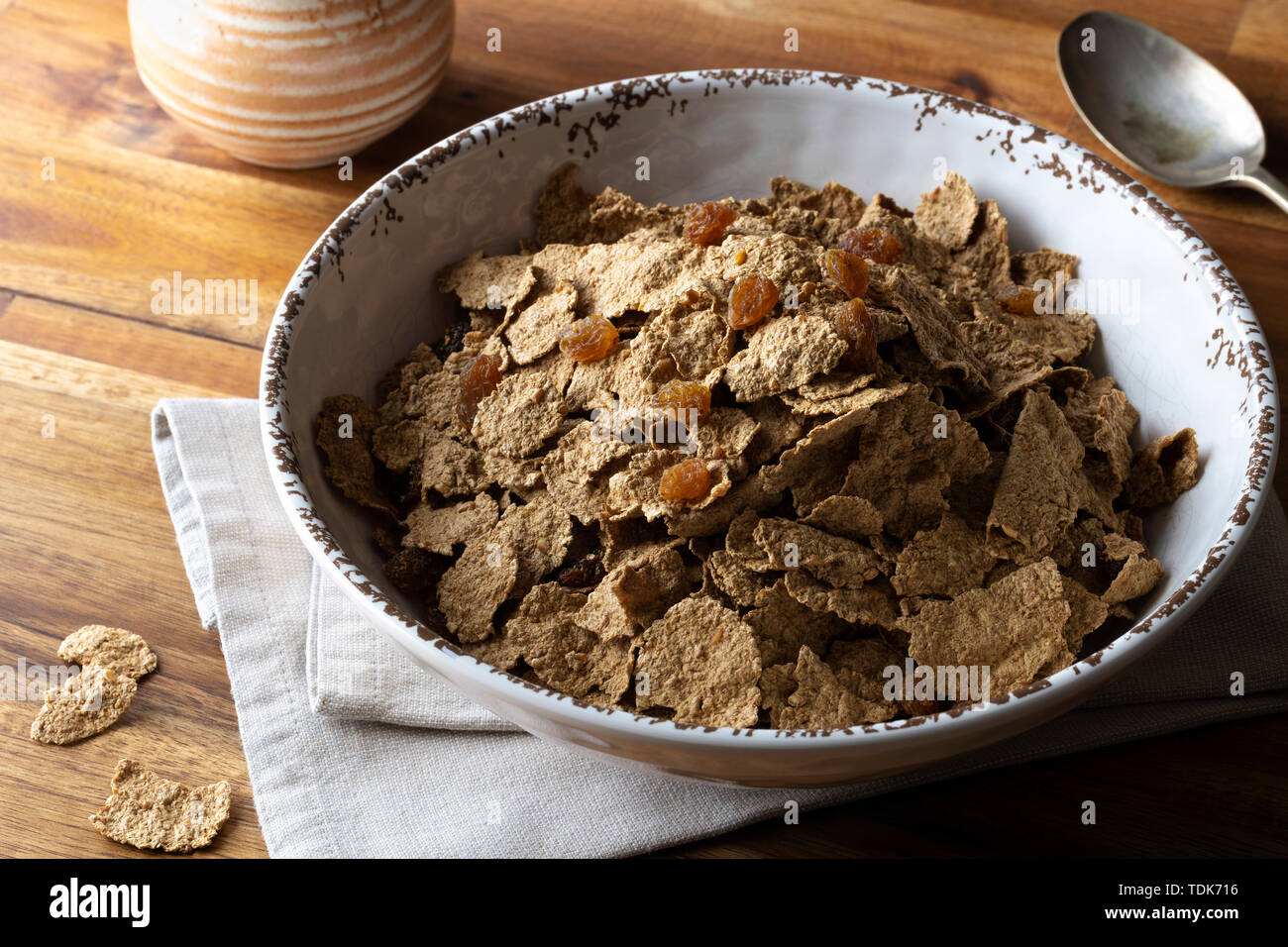 Healthy breakfast of wheat bran flakes with dried sultanas Stock Photo ...