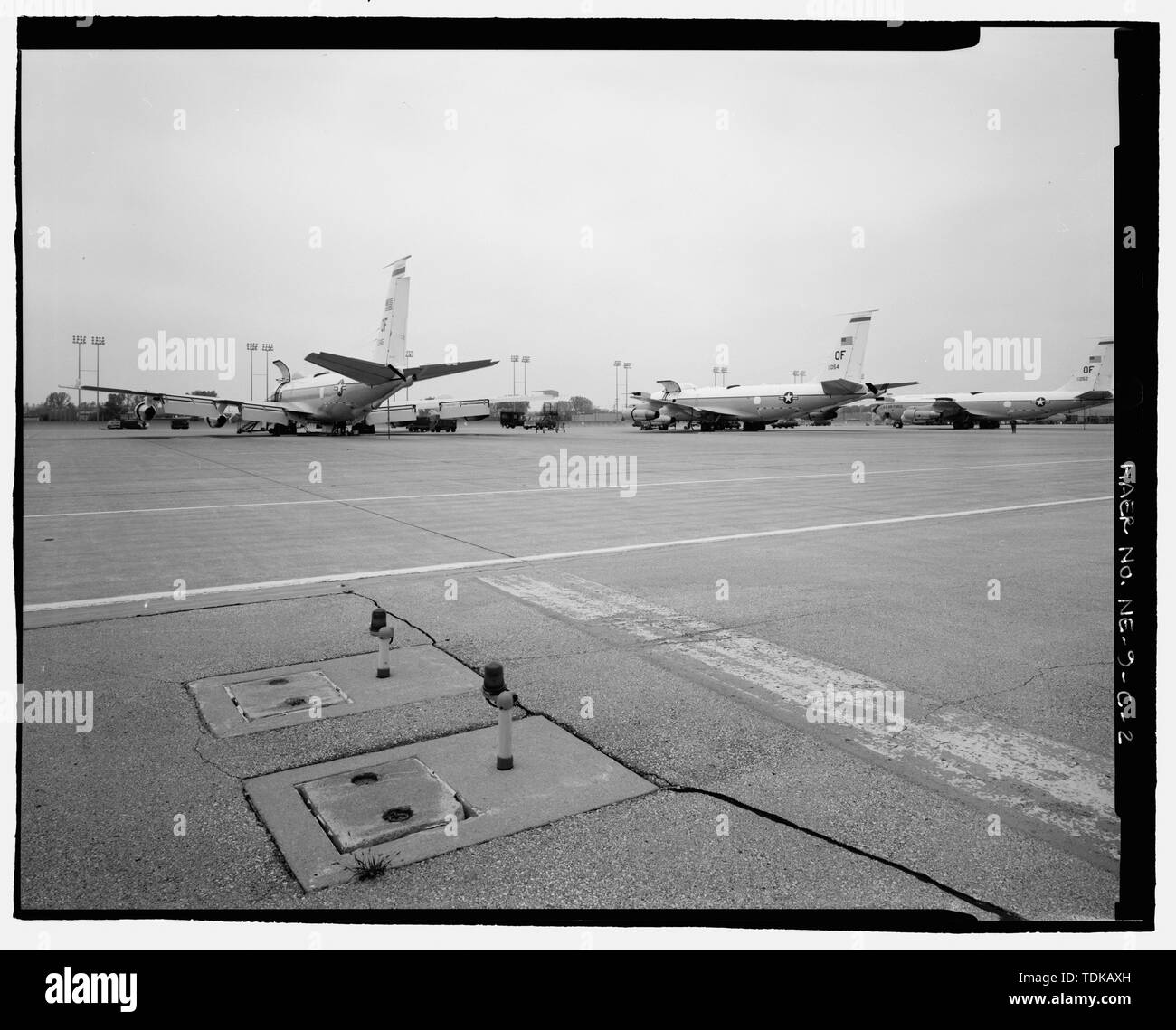 Operational apron with pit hydrants in foreground, aircraft in ...