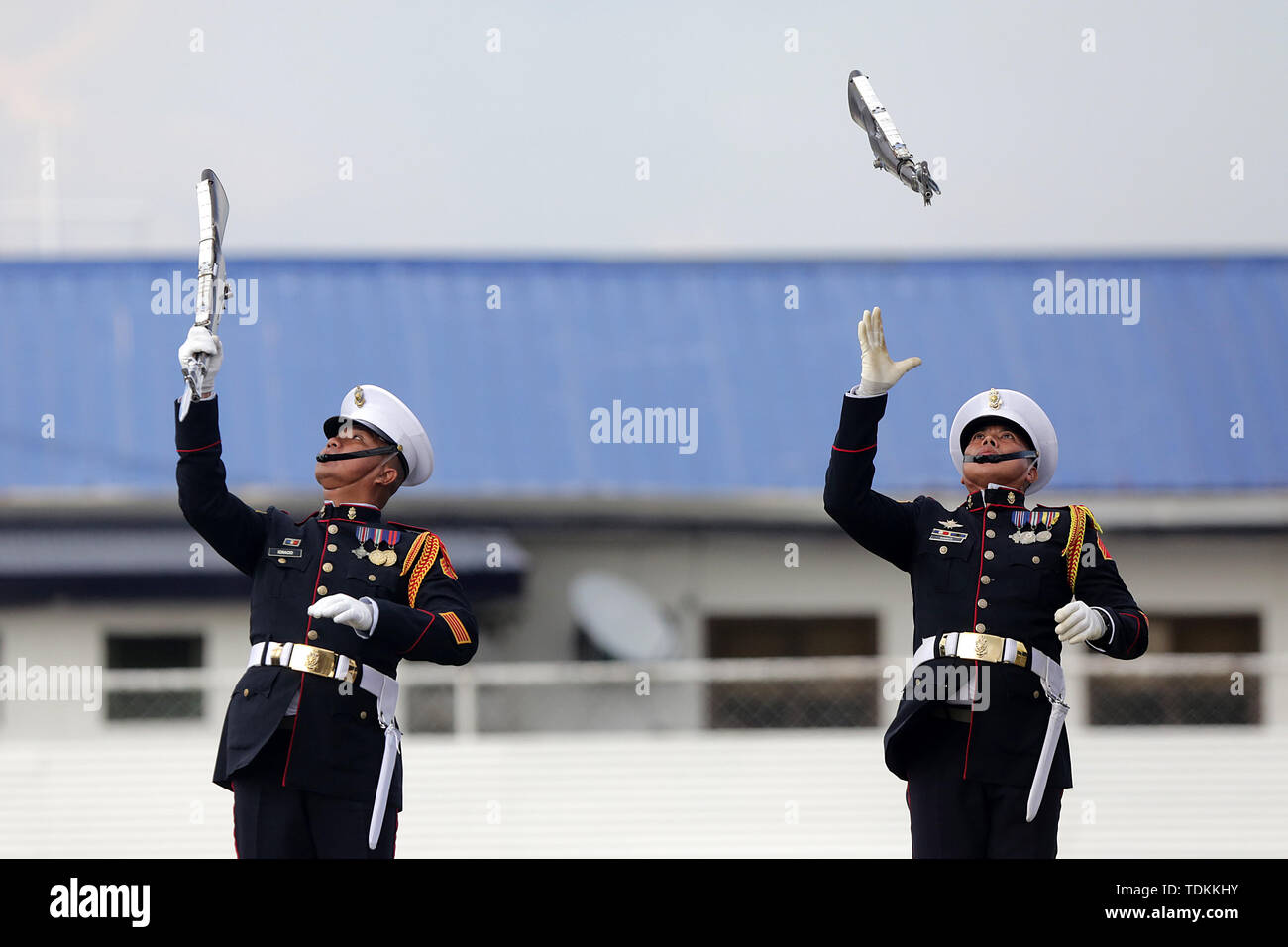 Cavite, Philippines. 17th June, 2019. Soldiers throw their rifles in ...