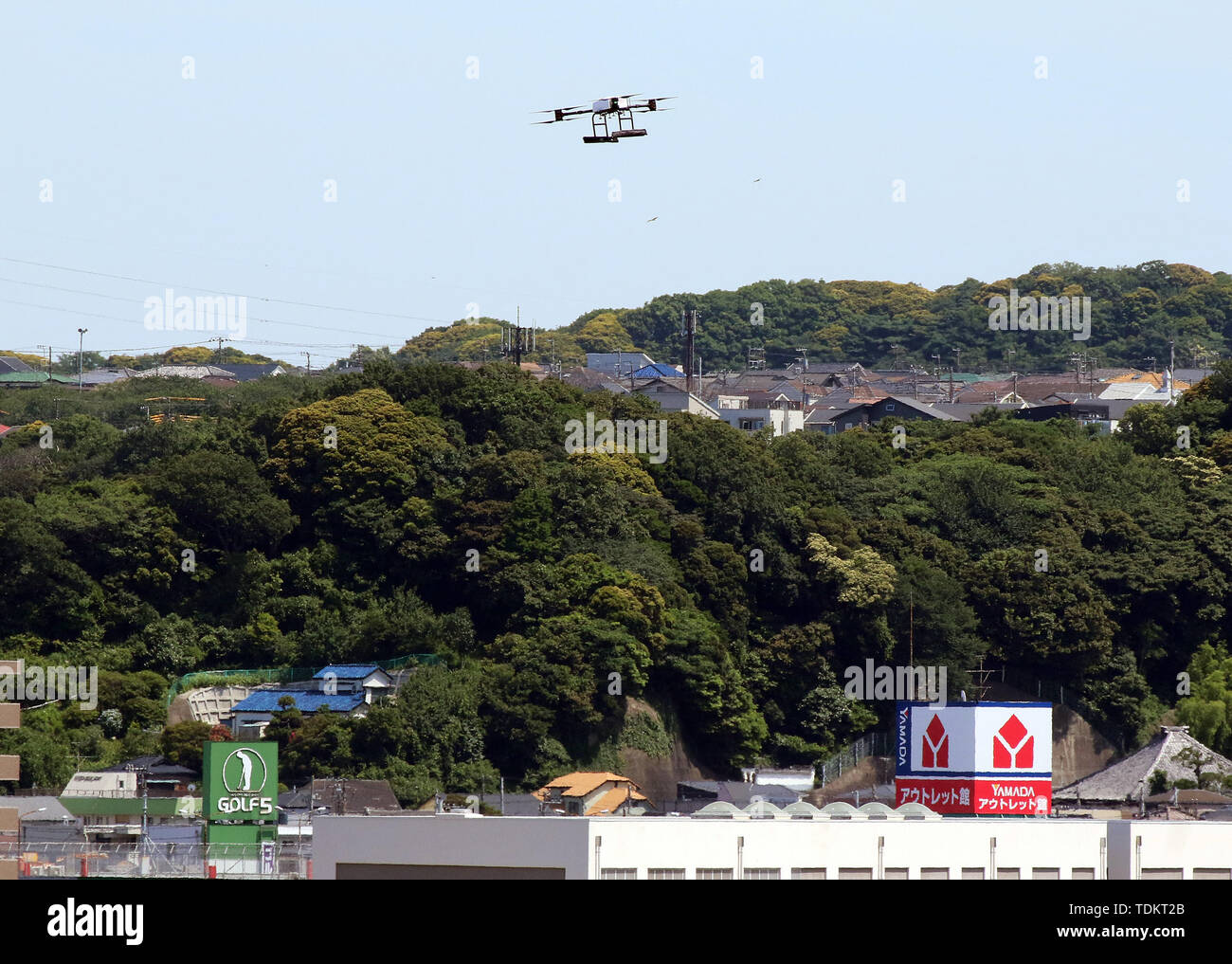 Yokosuka, Japan. 17th June, 2019. A drone returns from Sarushima island ...