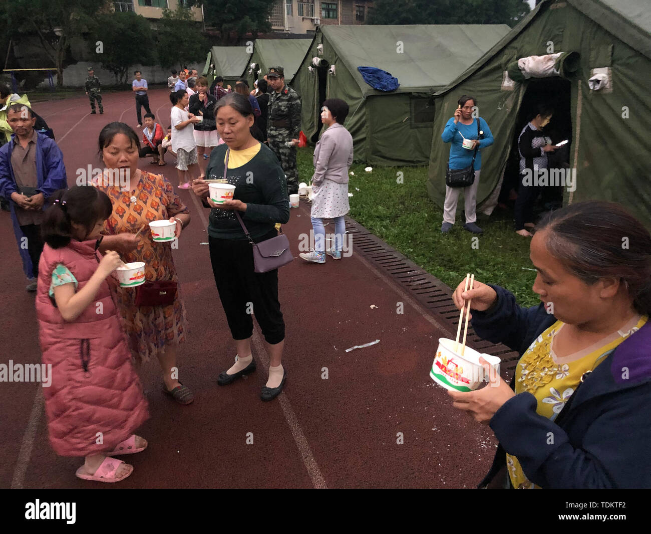 Changning, China's Sichuan Province. 18th June, 2019. People have ...