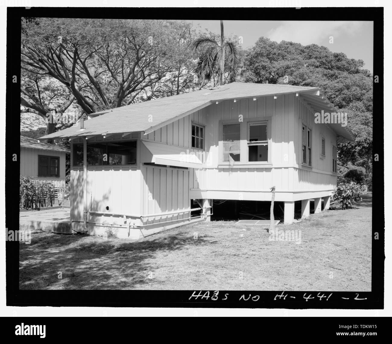 Oblique exterior view of rear and east side, with Facility 28 in ...