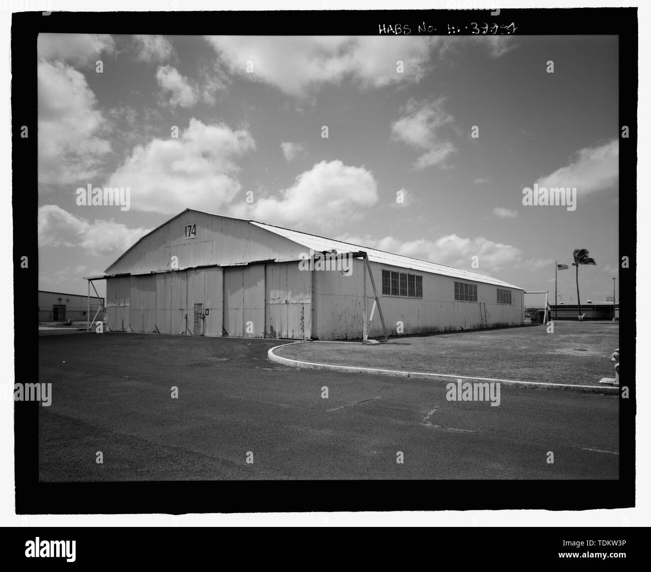 Oblique of north end and west side, brig is in background to the right ...