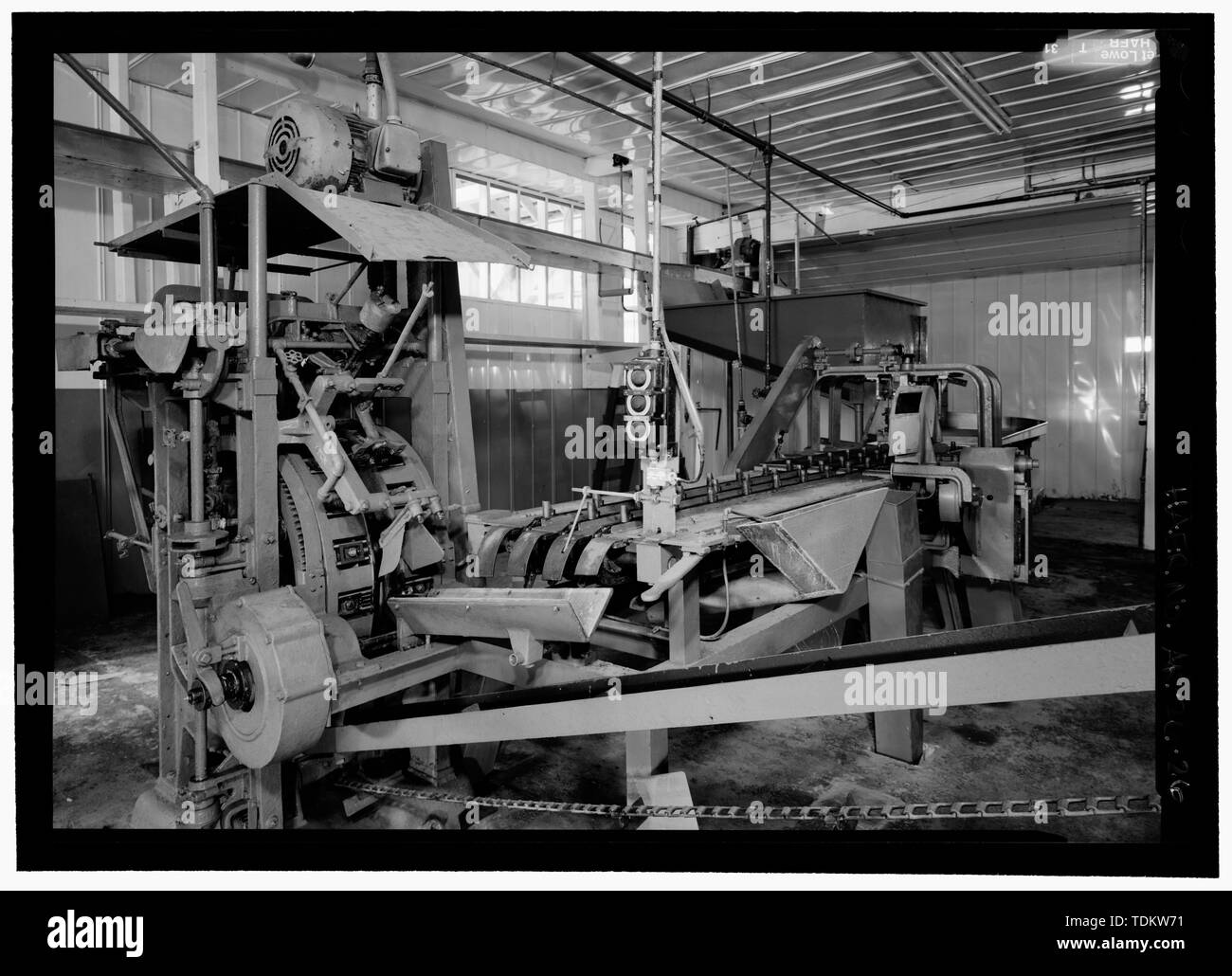 Fish conveyor Black and White Stock Photos & Images - Alamy