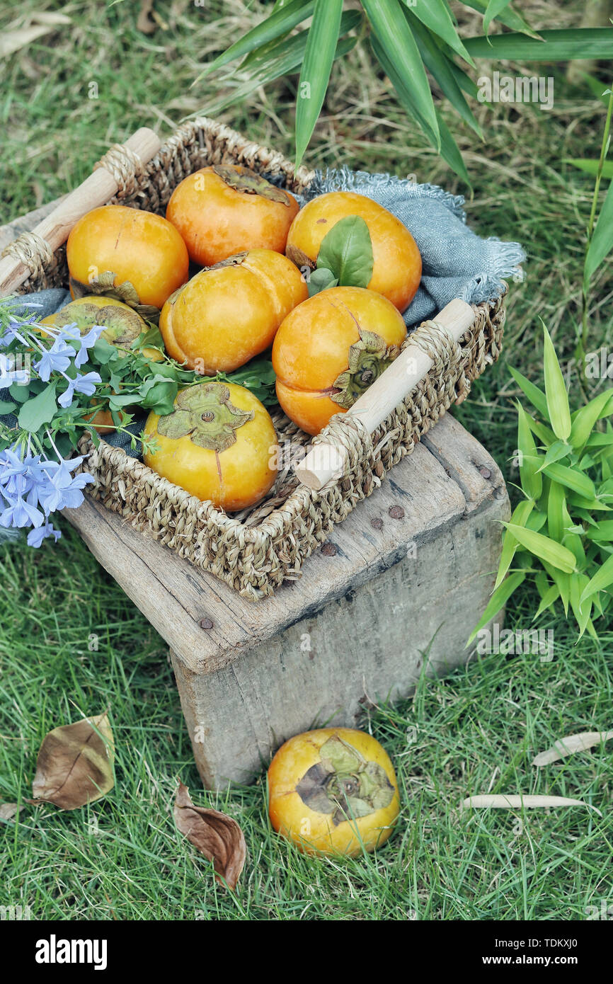 Fresh crispy persimmon Stock Photo - Alamy