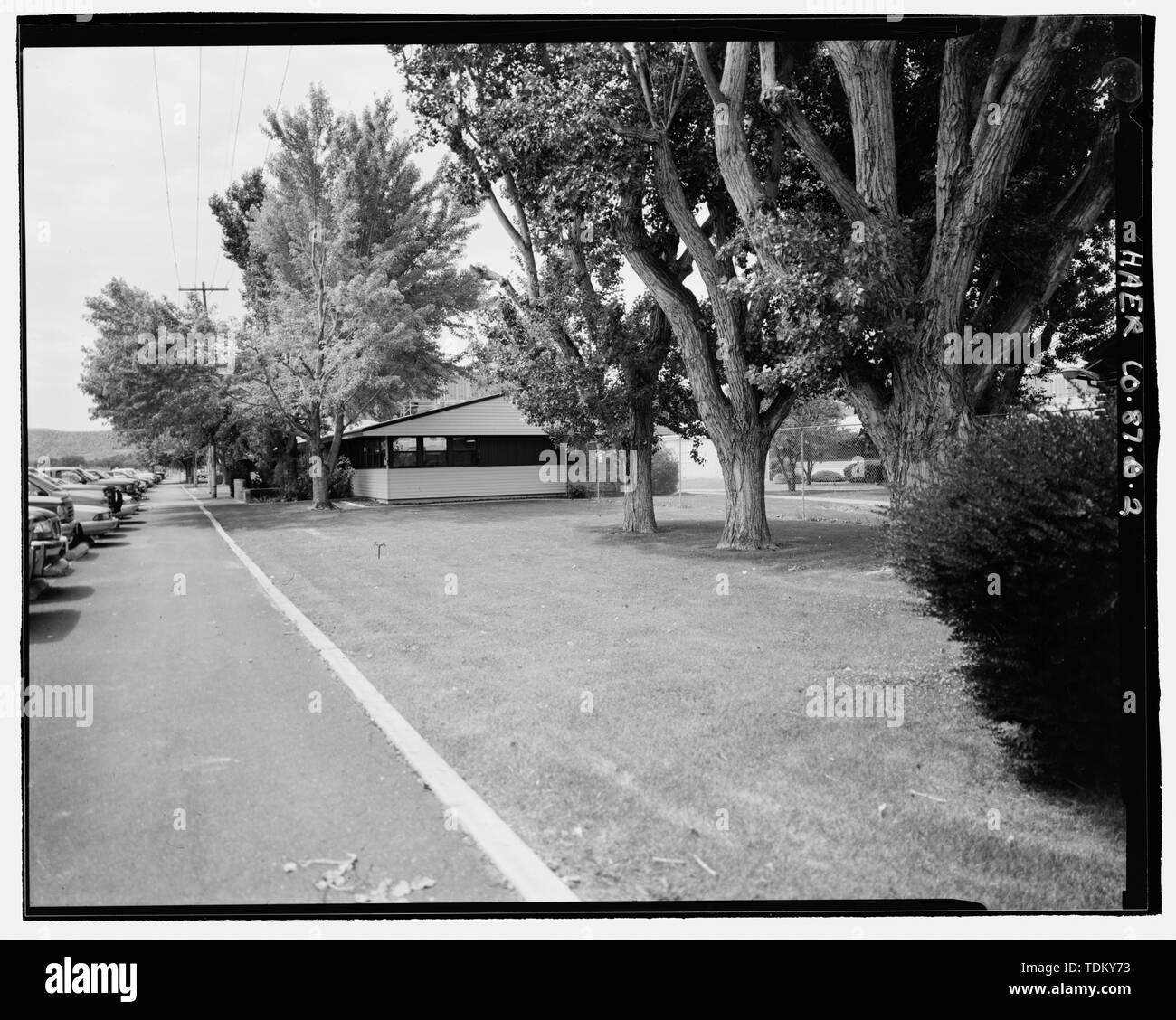 Oblique view of north elevation of north section of building. LOOKING ...