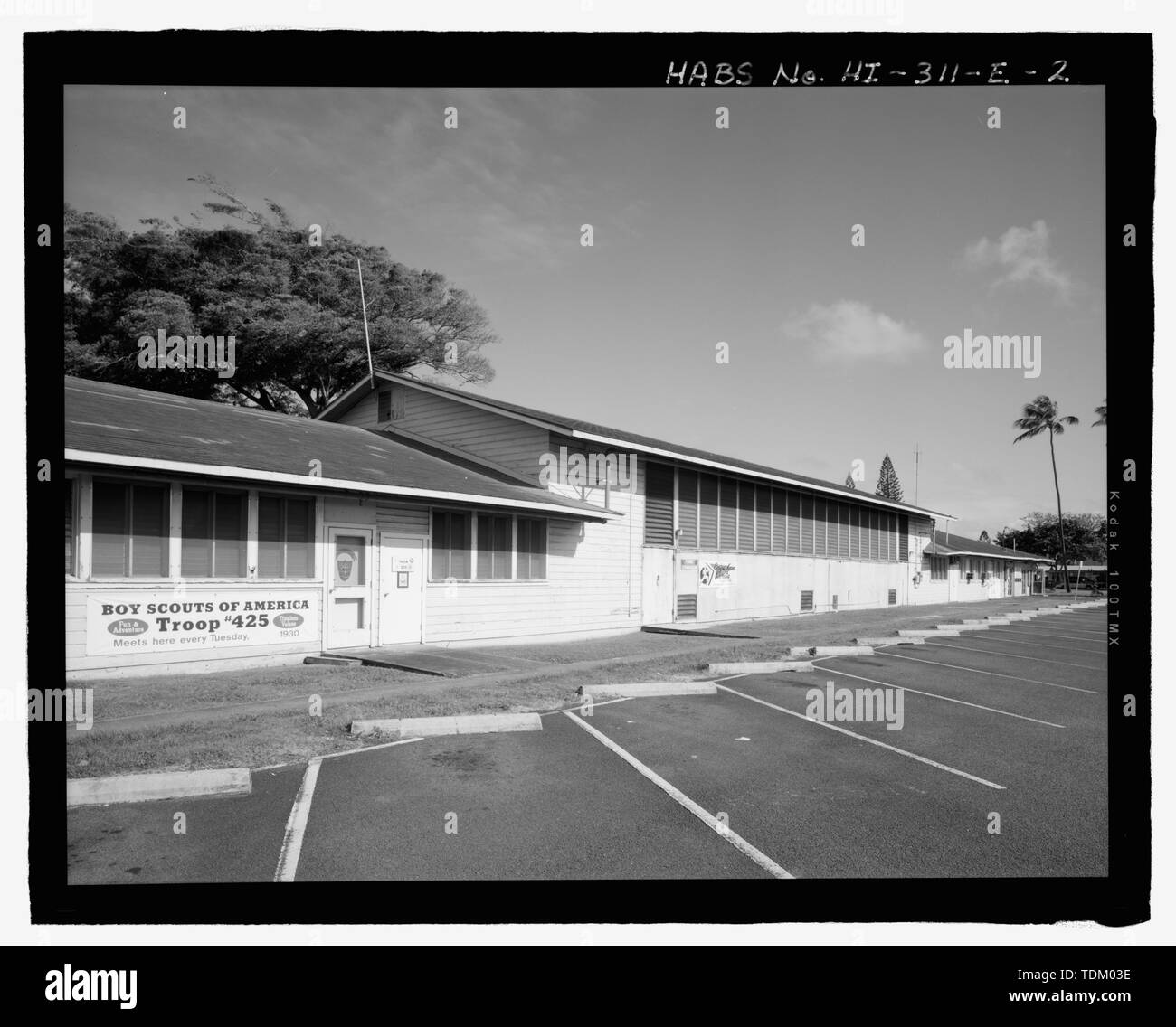Oblique view of the east side of Building 455, showing the fixed wood ...