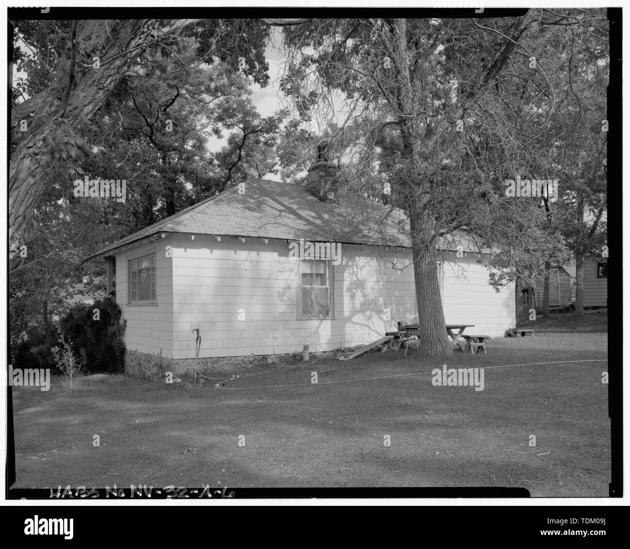 Oblique view showing north and west elevations; camera facing southeast ...