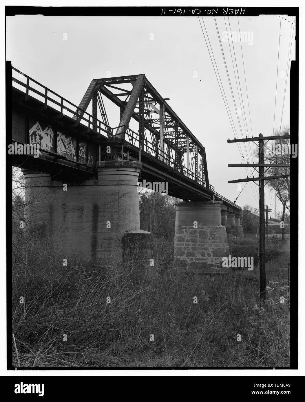 Oblique view to north-northwest of upstream (east) side of bridge ...