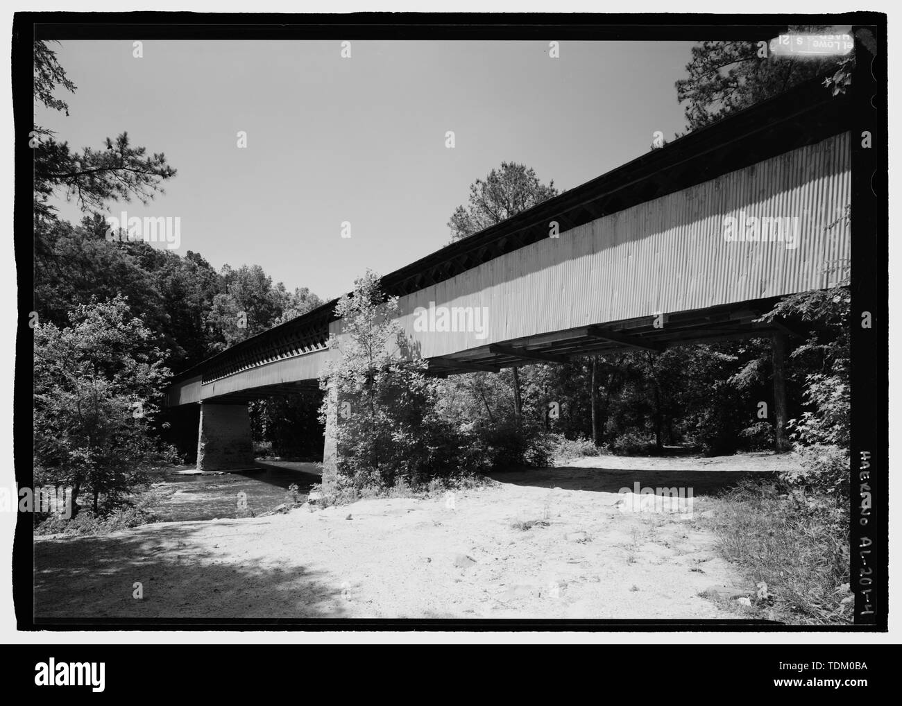Oblique view, looking S. Note galvanized corrugated metal siding ...
