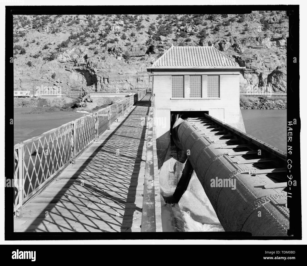 Oblique view, looking east-northeast, of top of diversion dam. Service ...
