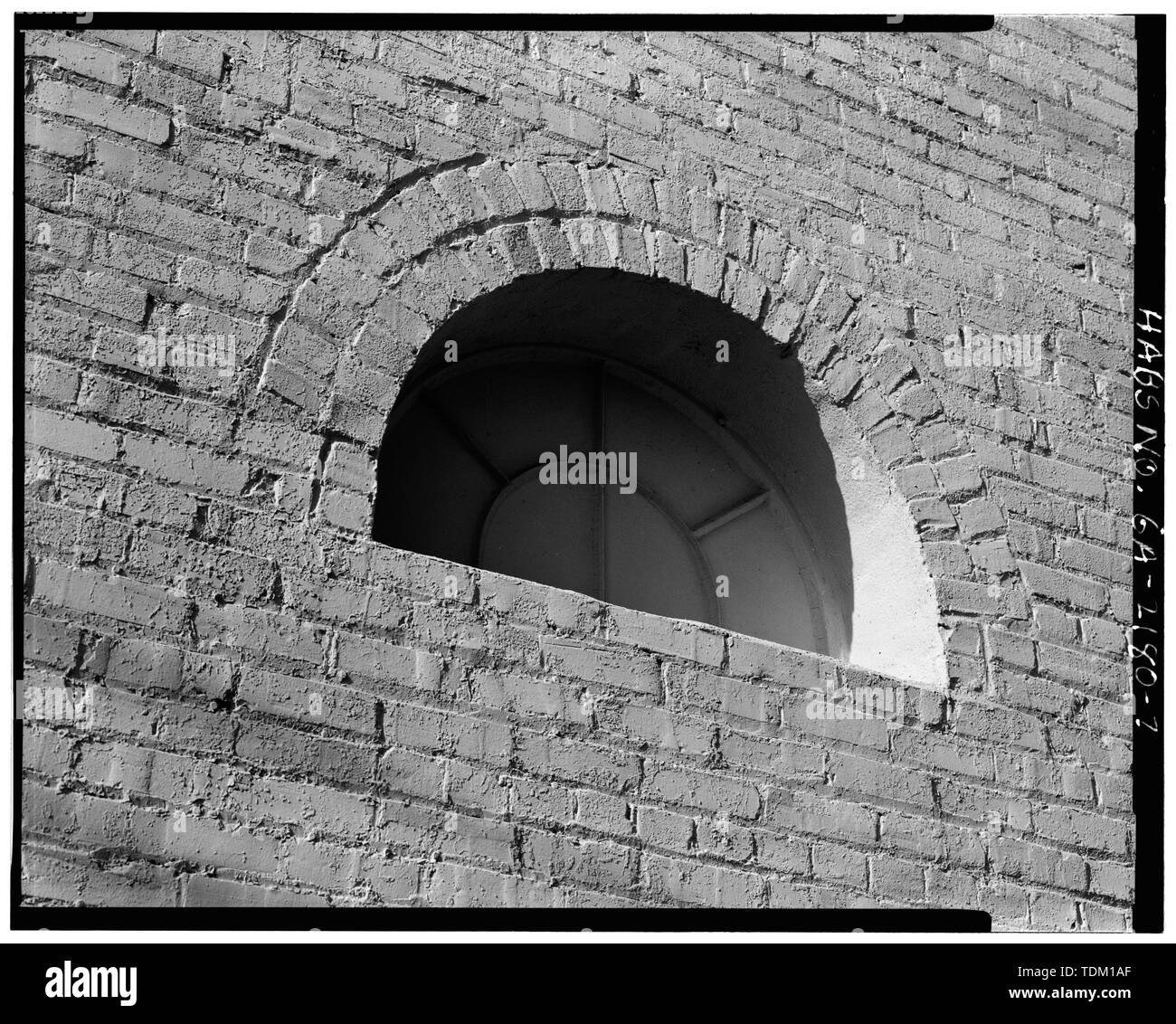 Outside detail of fanlight window on side of store front - 3818 East ...