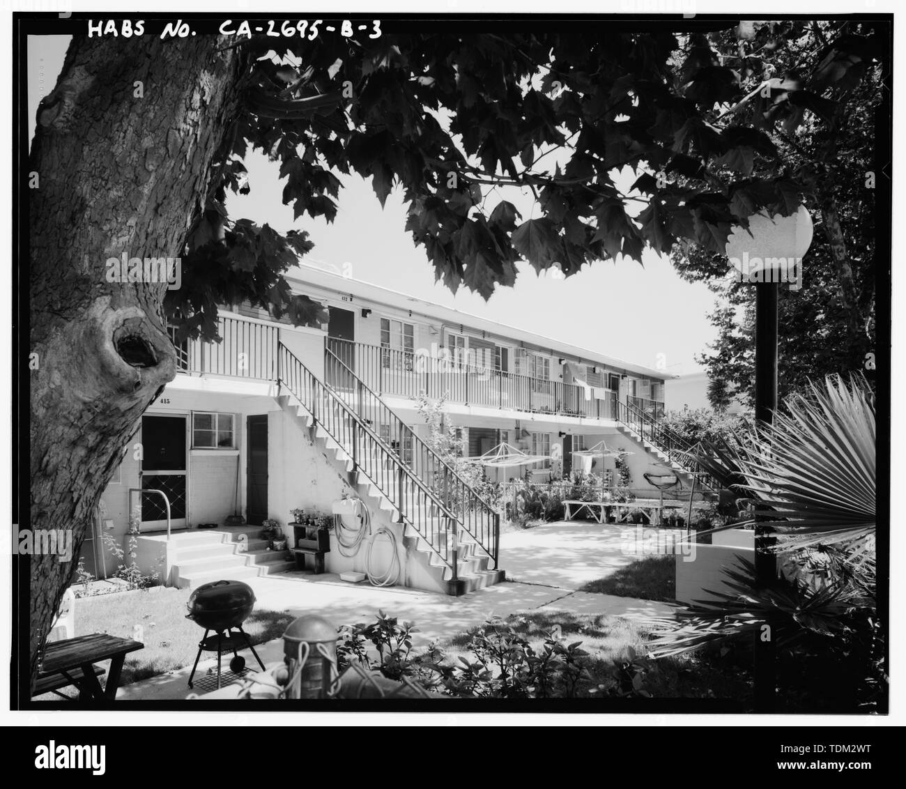 Overview of two story walk-up flat type unit illustrating projecting ...