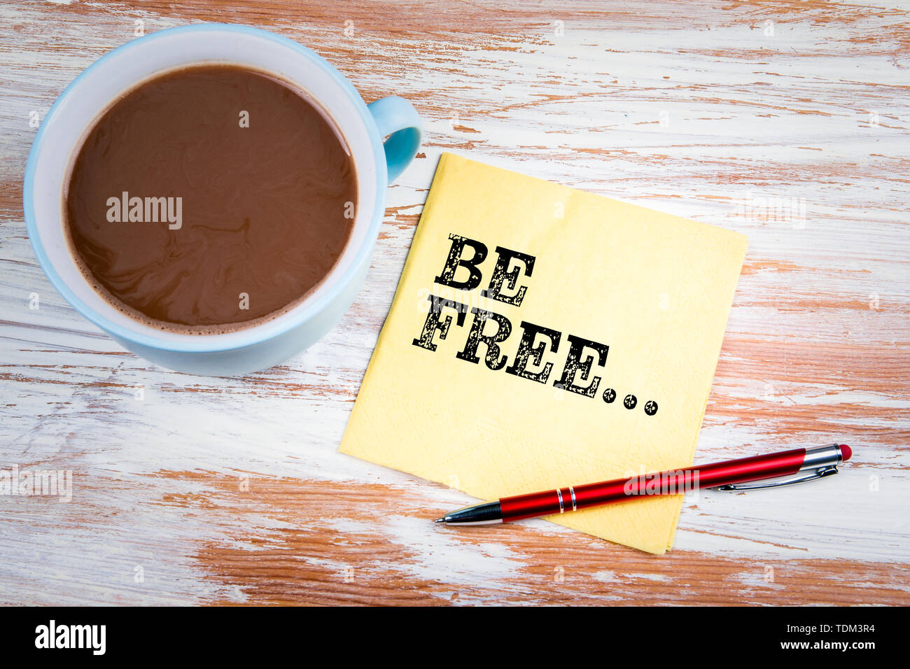 BE FREE concept. Text on a napkin Stock Photo - Alamy