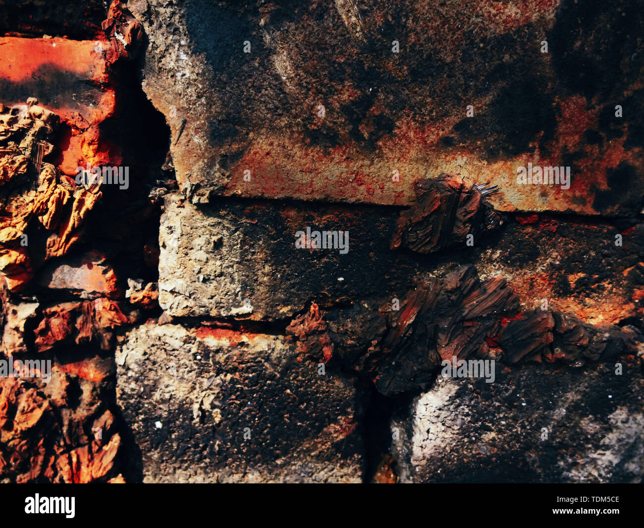 Burned red brick walls Stock Photo - Alamy