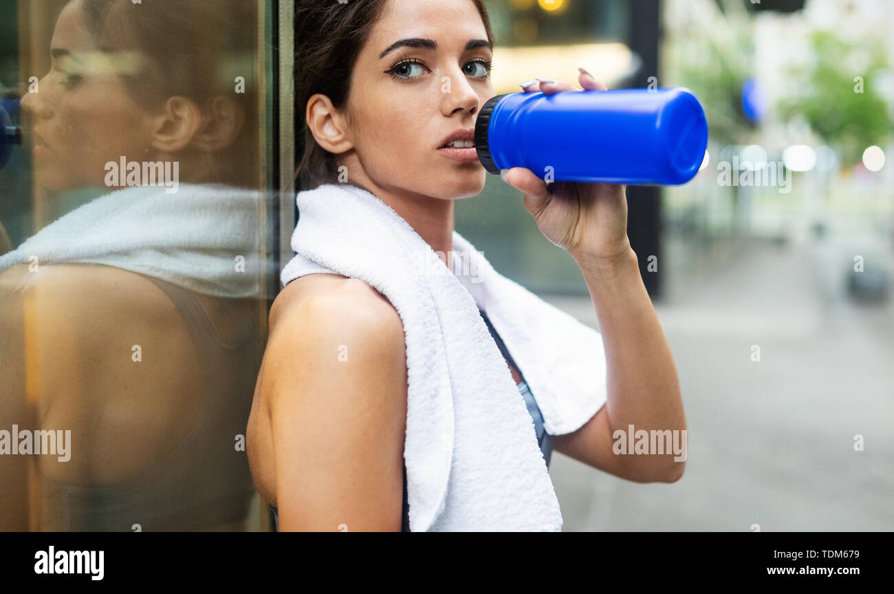 Beautiful happy fit woman running and exercising outdoor Stock Photo ...