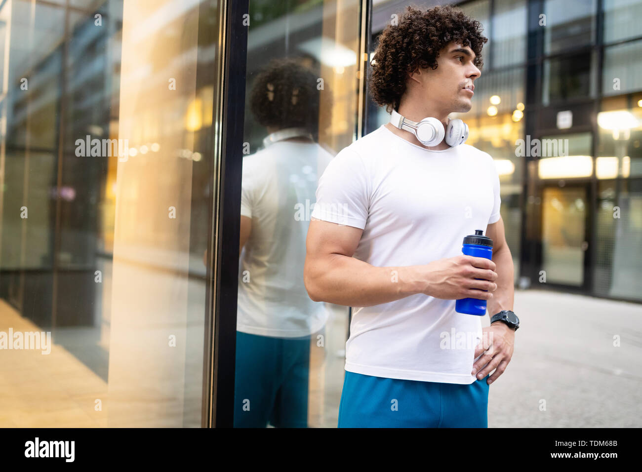 Handsome muscular fit young man hi-res stock photography and images - Alamy