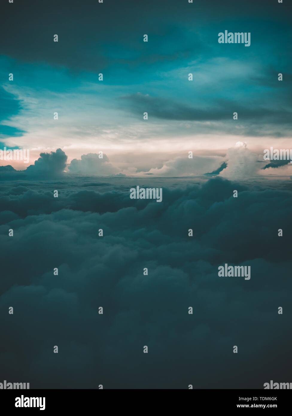Aerial shot of the clouds from high altitude at night Stock Photo - Alamy