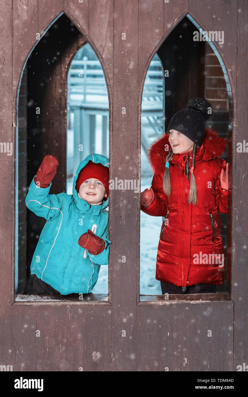 Children playing out the window hi-res stock photography and images - Alamy